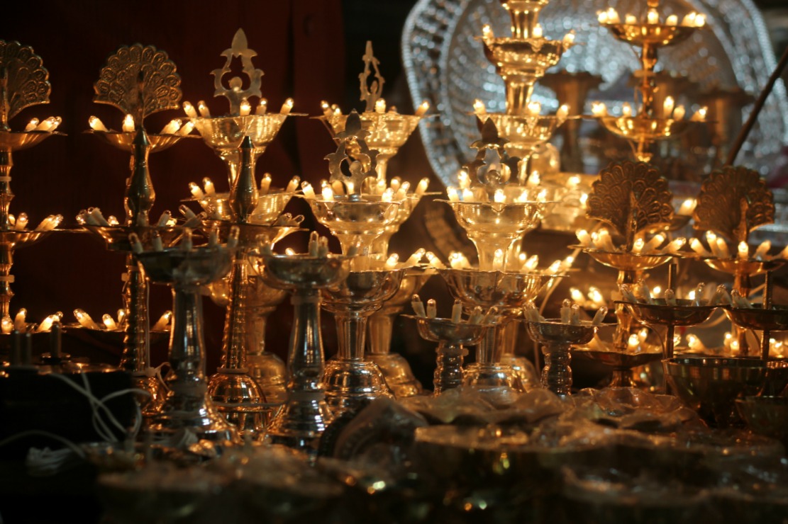 A Radiant Display of Traditional Oil Lamps at Poompuhar Emporium, Tamil ...
