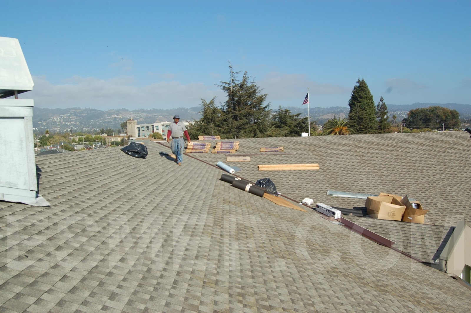 Under construction: Recently completed roof shingles work