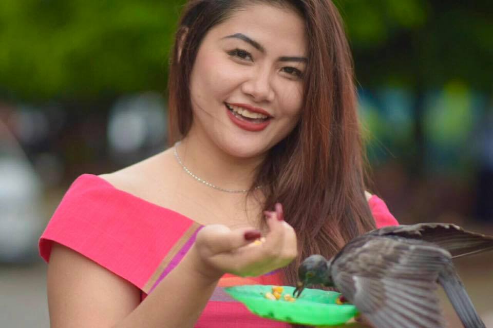 Celebrity May Pachi shares her snaps feeding pigeons in Yangon