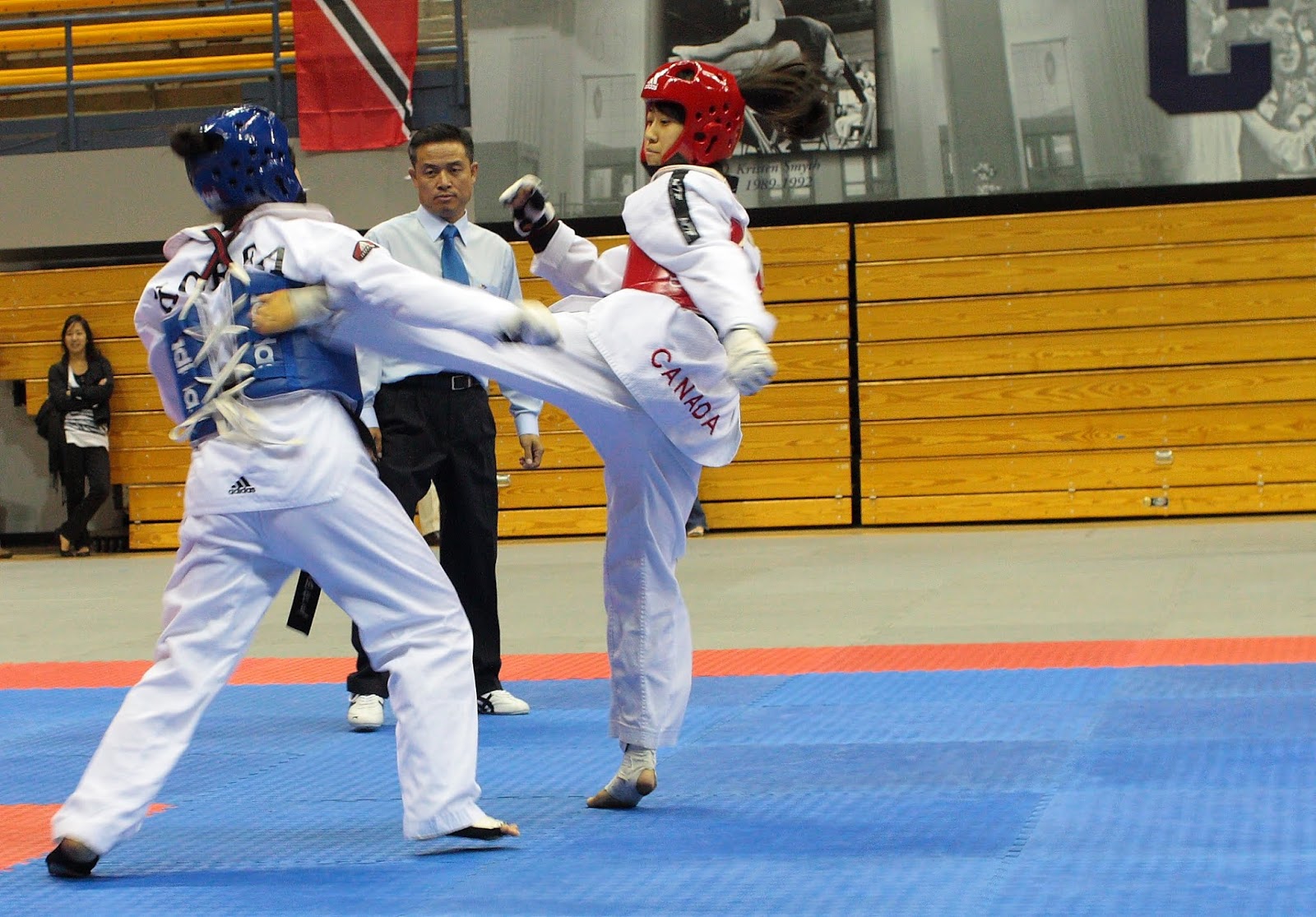 "Kick in the behind" nghĩa là gì?