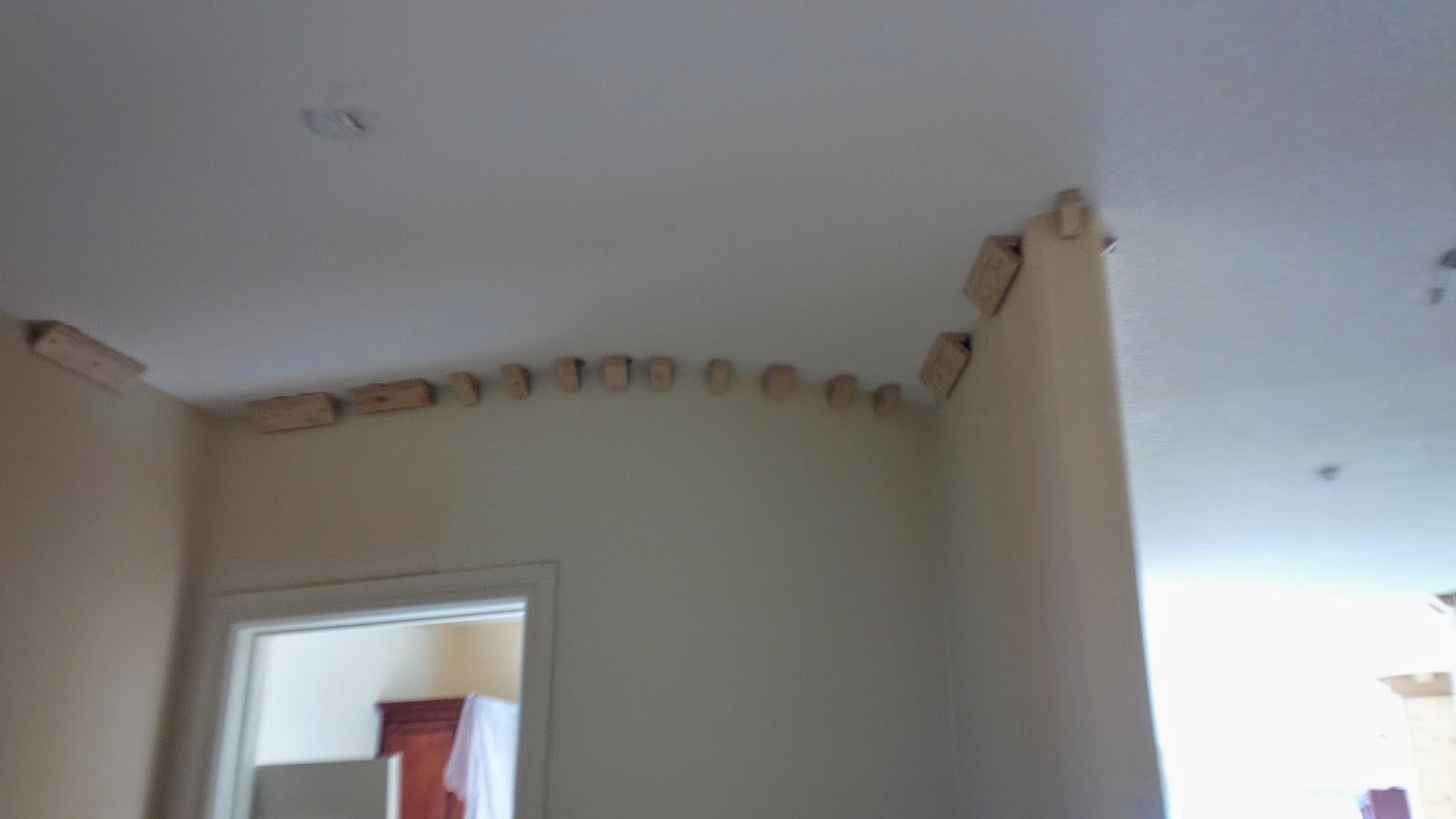 Exclusive Spaces: Installing Curved Crown Molding