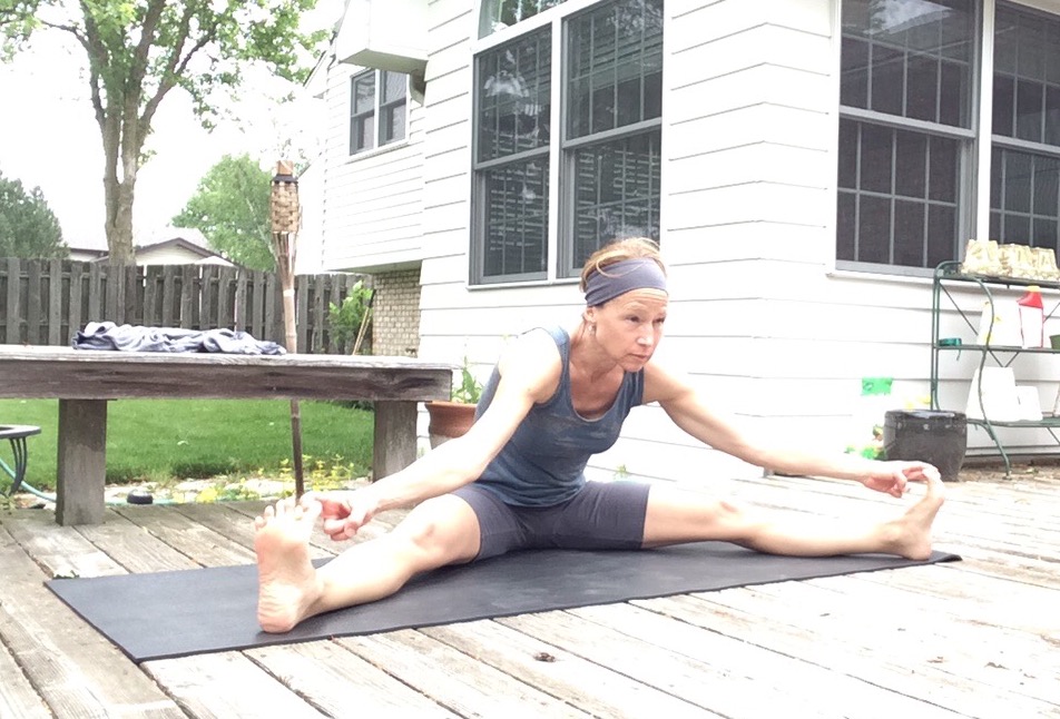 Open your legs wide for wide legged forward bend. Again, bend forward ...