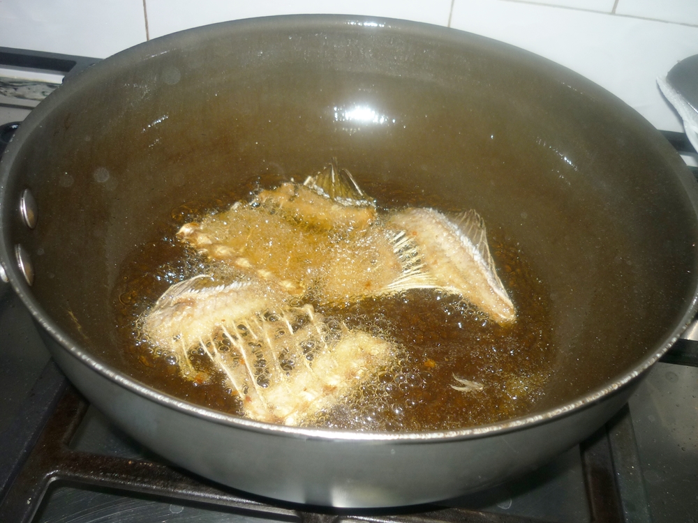 aunty celia's family meals: Sole fish bone with Sichuan preserved veg soup