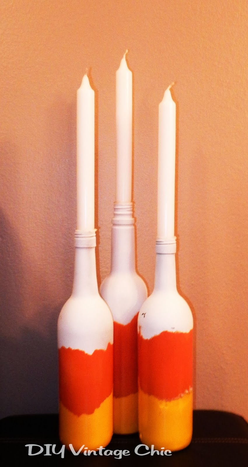Creepy Candy Corn Candlesticks from Upcycled Bottles