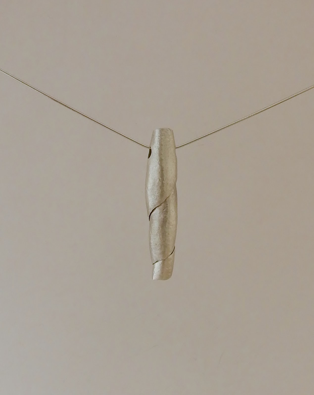 Synclastic spiral beads - made of silver