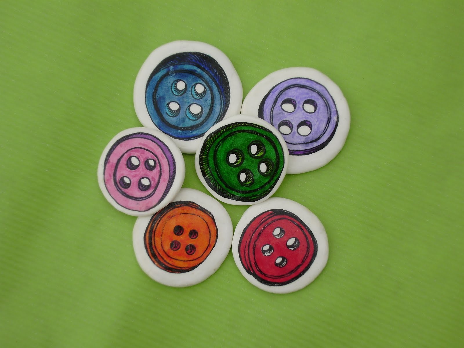 Faroteo: Broches botones