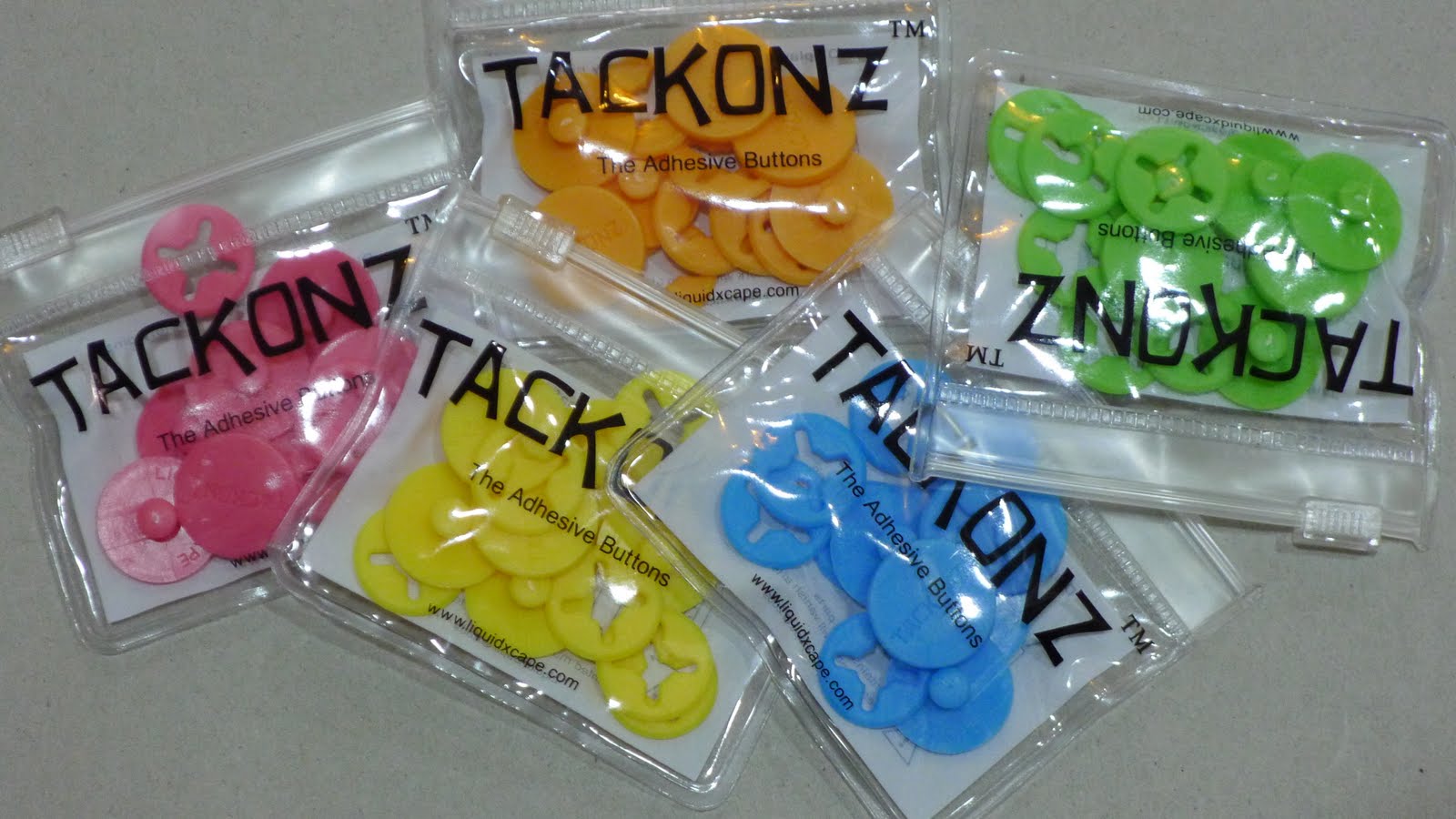 Ccube Sports HUB: TackOnz - The Adhesive Race Bib Button