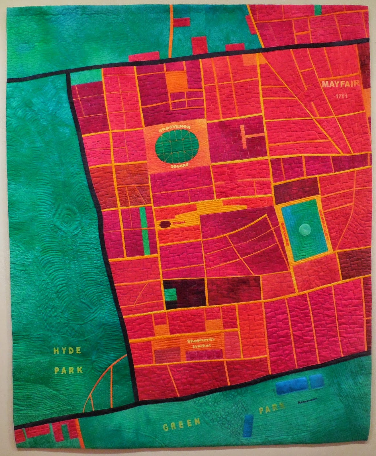 Art With a Needle: Q = A = Q 7 -- maps