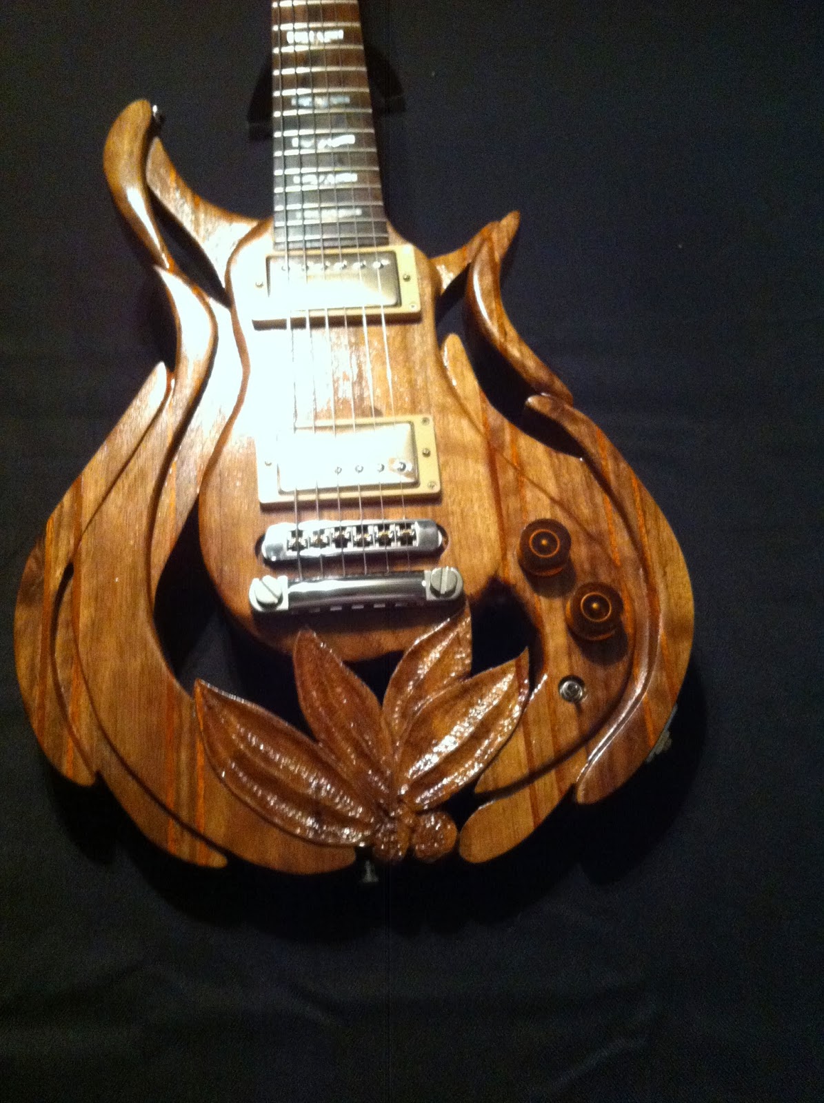 Jim's page: Carved Walnut Guitar
