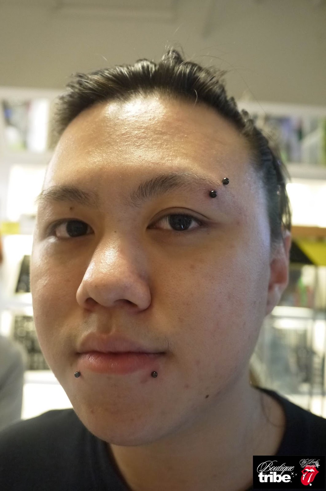 Vie Body Piercing @ Boutique Tribe: Eyebrow+snake bites piercing