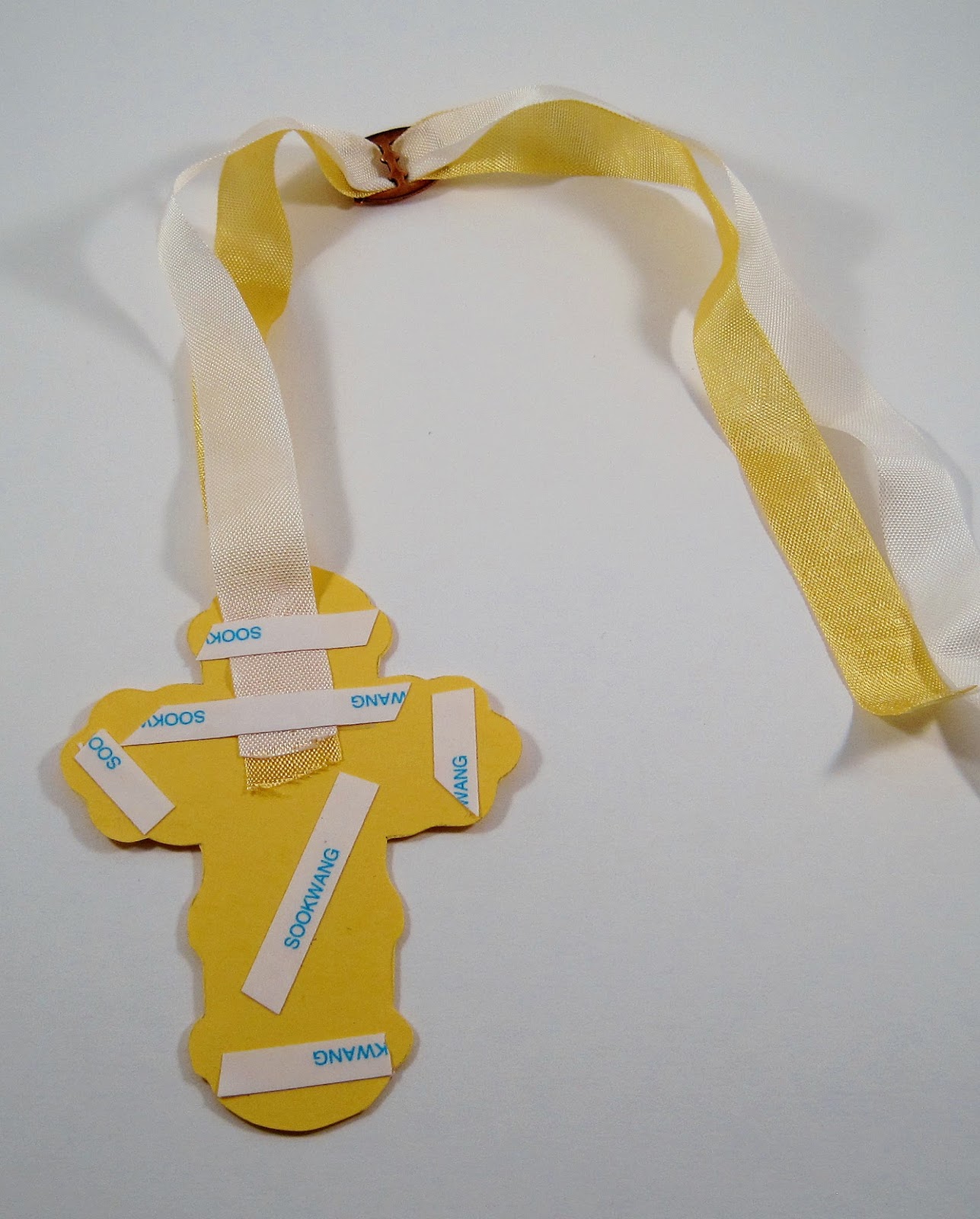 Twinshappy: Cross Bookmark