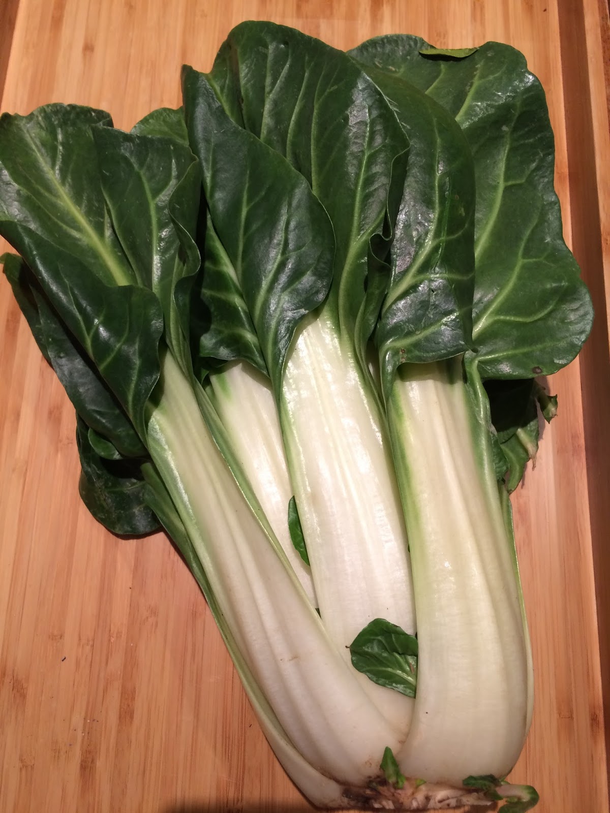 Egypt's way to always eat your greens: 'Olass wa sal' - taro root with ...