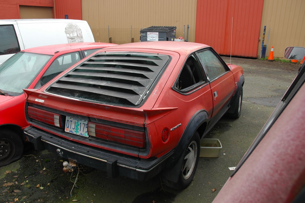 OLD PARKED CARS.: 1981 AMC Eagle SX/4.
