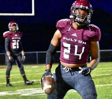 High School football player killed shielding girls from gunfire