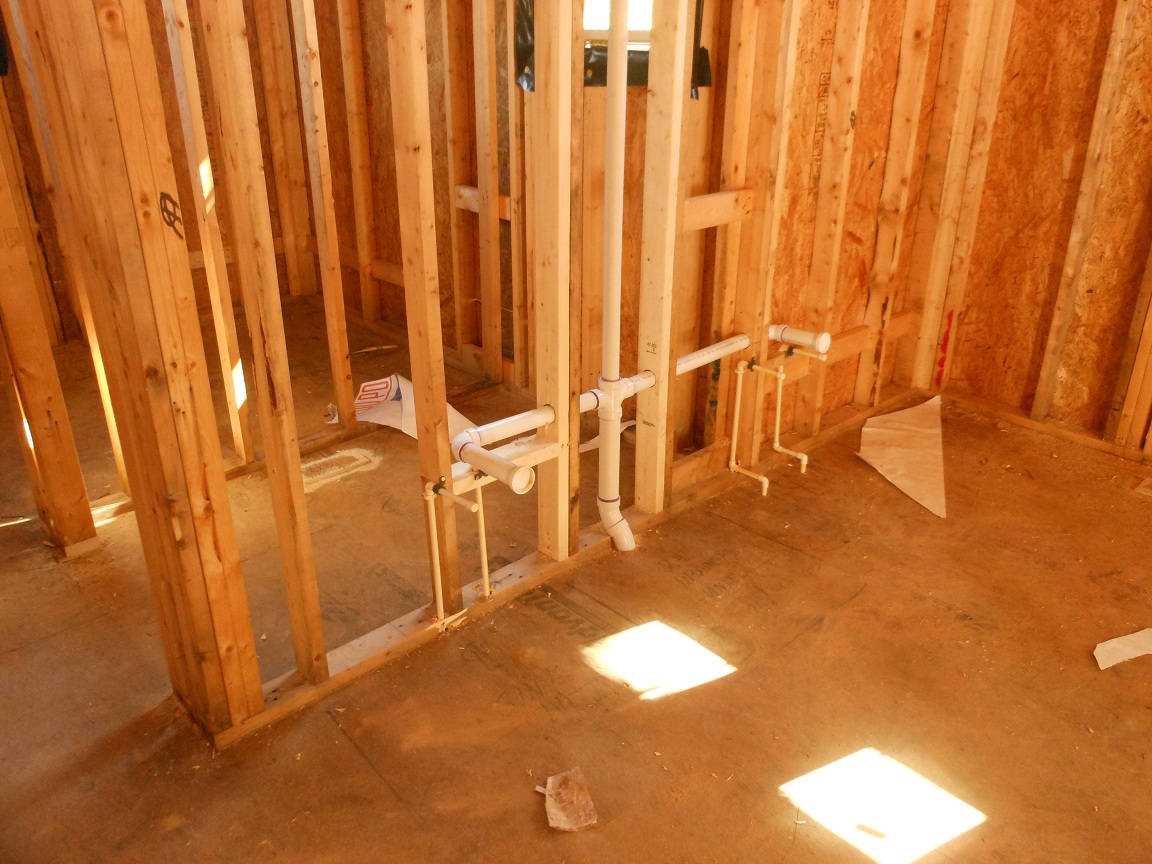 Triplett's New House: House Wrap, Windows, and Rough Ins