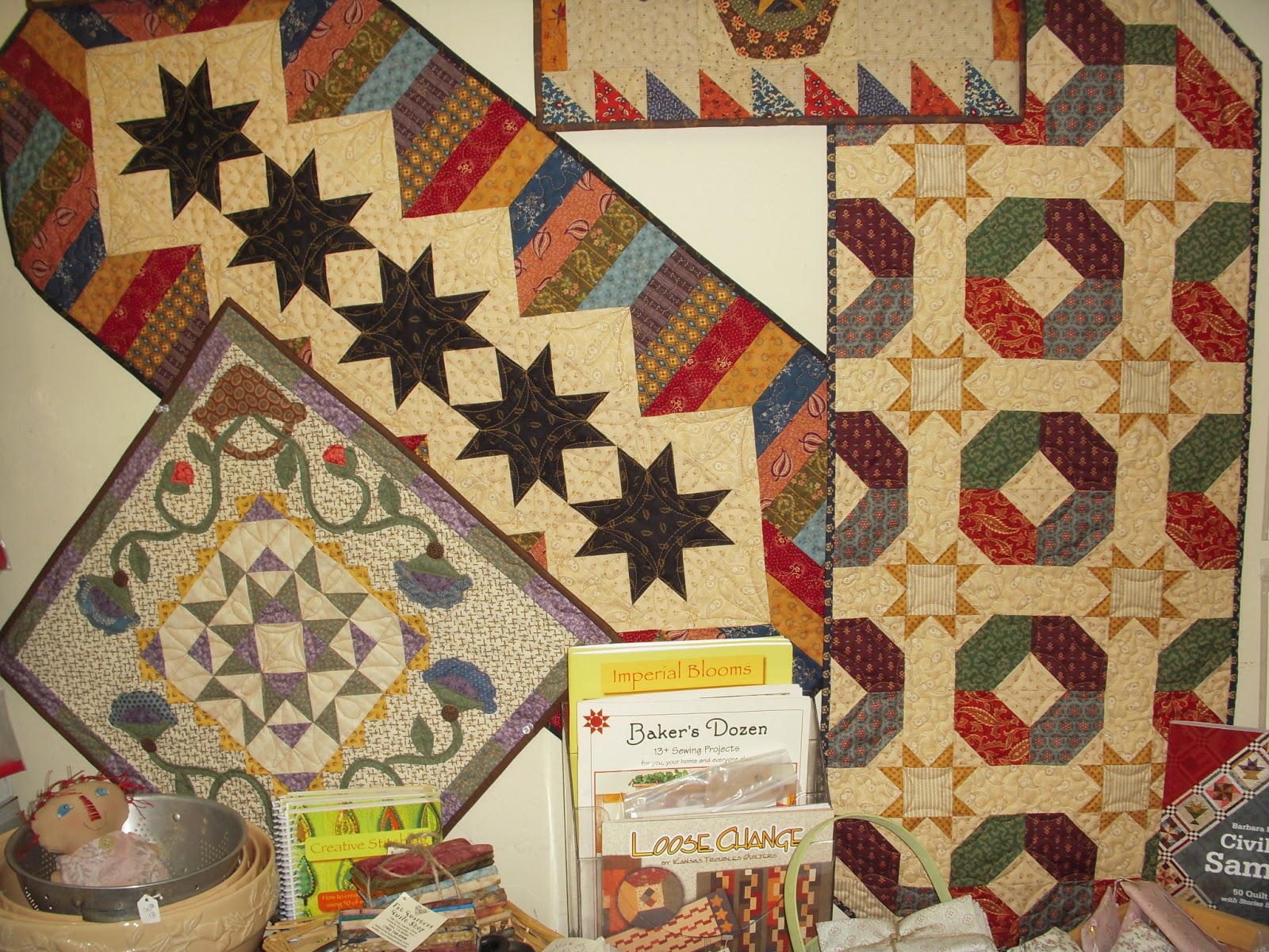 Fat Quarters Quilt Shop: Snuggles Quilts Trunk Show on Display...