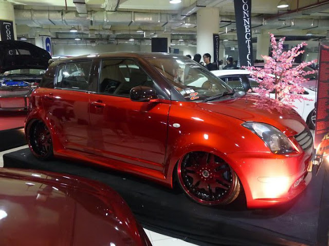 japanese custom cars: Candy Red Suzuki Swift