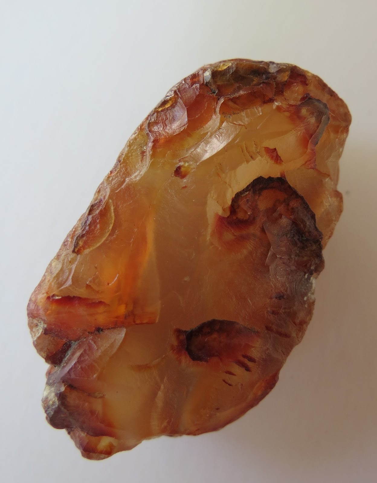 Archaeology of Portable Rock Art: Small translucent human head pebble ...