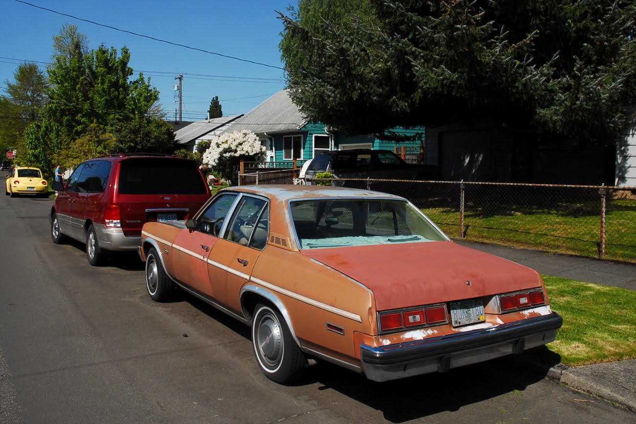 OLD PARKED CARS.: 1977 Chevrolet Concours.