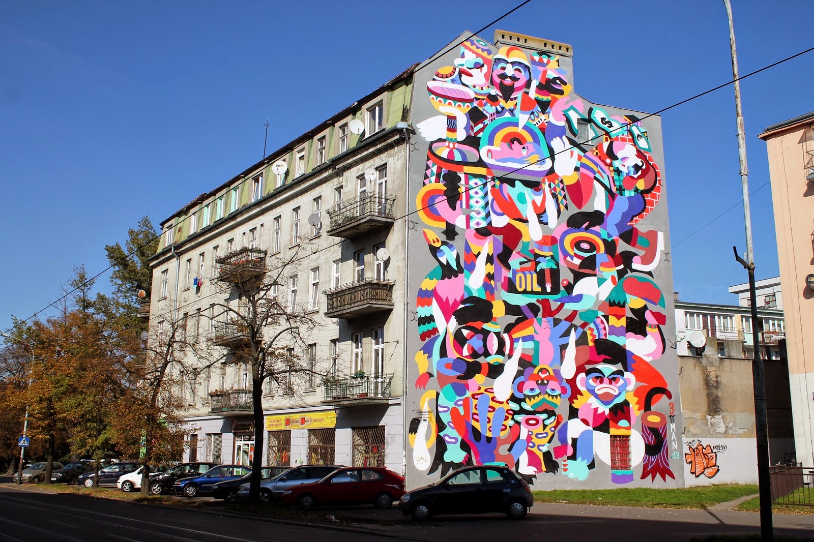 baedeker łódzki: Łódź. Mural przy ulicy Rzgowskiej 52.
