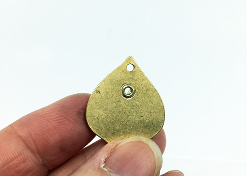 How to Rivet Two Metal Pendants Together for a Unique Design! / The ...