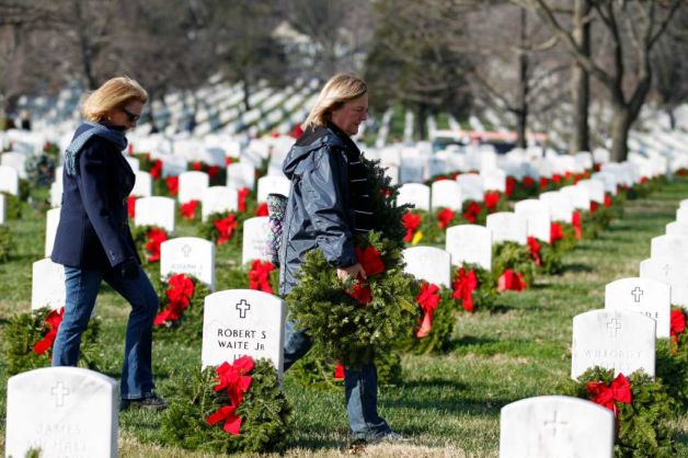 Life Spot: Photos of volunteers placing wreaths on grave sites today...