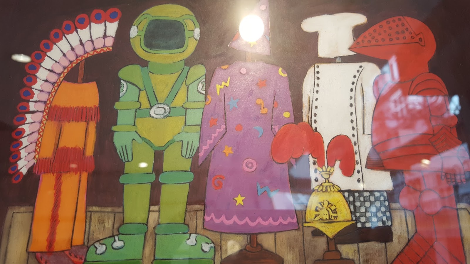 Evans is a place on Earth: As if by magic the shopkeeper appeared.