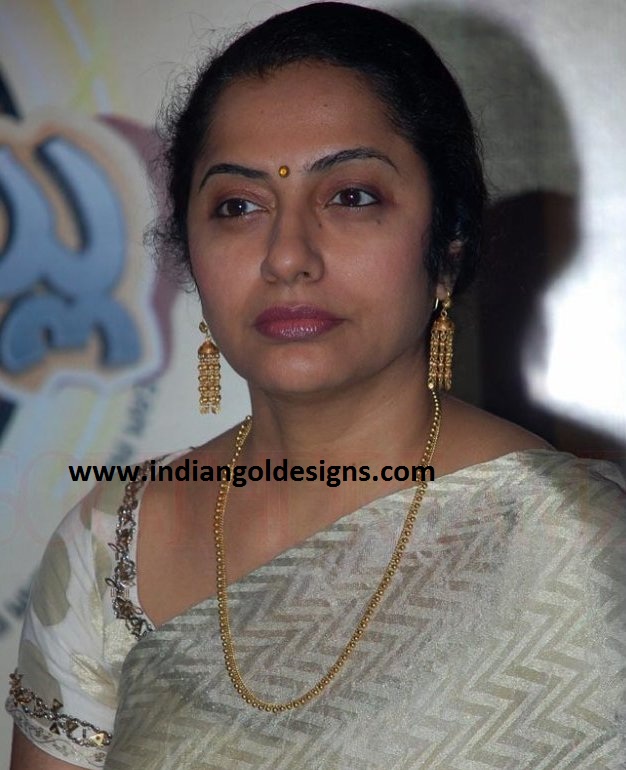 indiangoldesigns.com: Suhasini in gold long haaram and modern style jhumkas