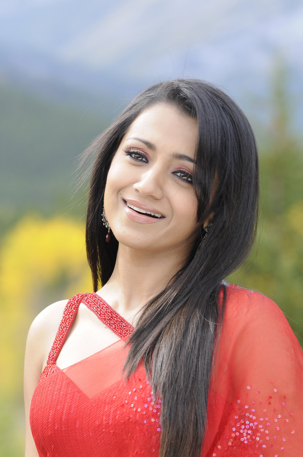 Trisha awesome navel show through a red transparent saree latest pics