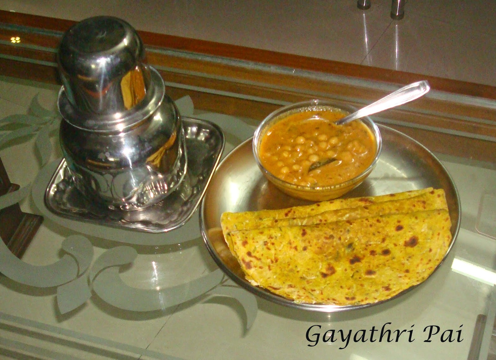 Gayathri Pai's Food Bytes: White Vatana Curry with Radish Paratha.