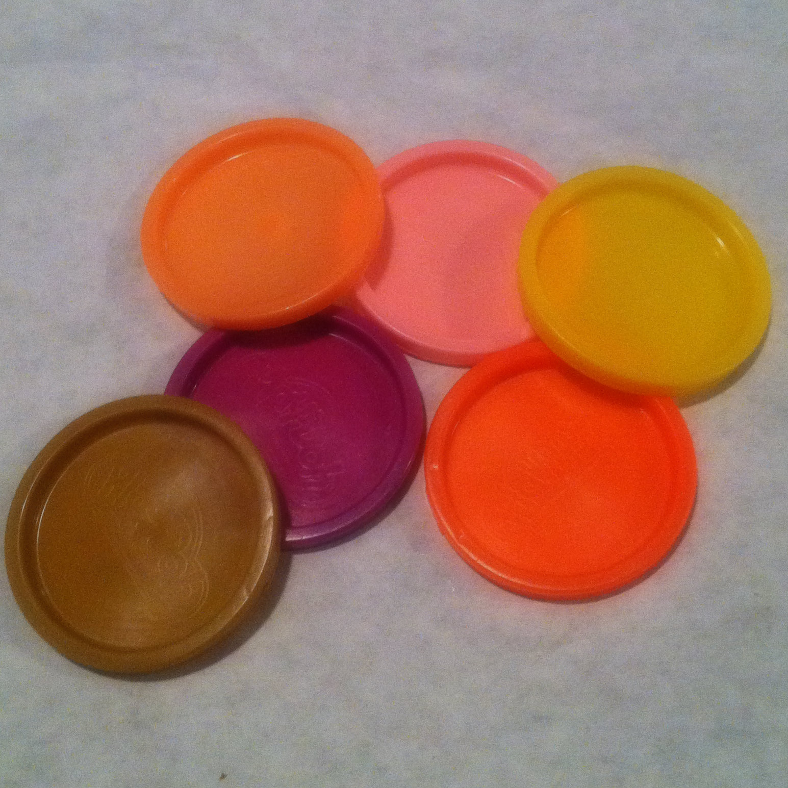 Play-doh Lids Become Mini Magnet Masterpieces {Fun for Kids}