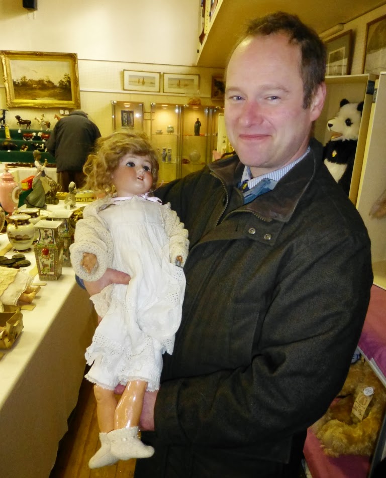 The very picture of a loving doll