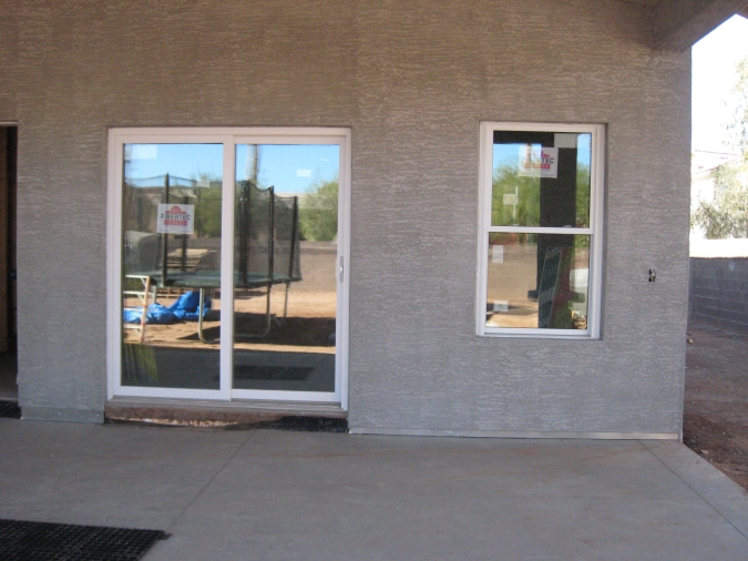 Guymon House: Doors & Stucco