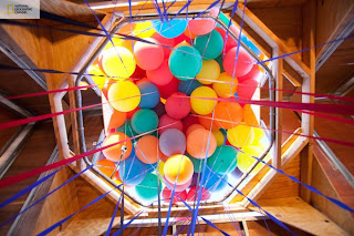 A House Lifted Using Balloons