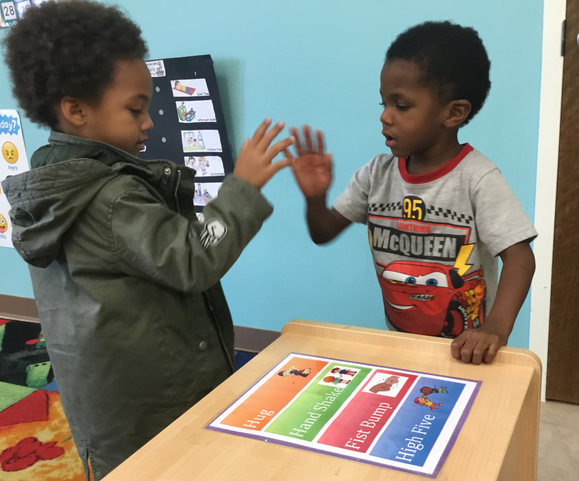 Academy of Harpeth Village: Hug, Handshake, High Five, or Fist Bump!