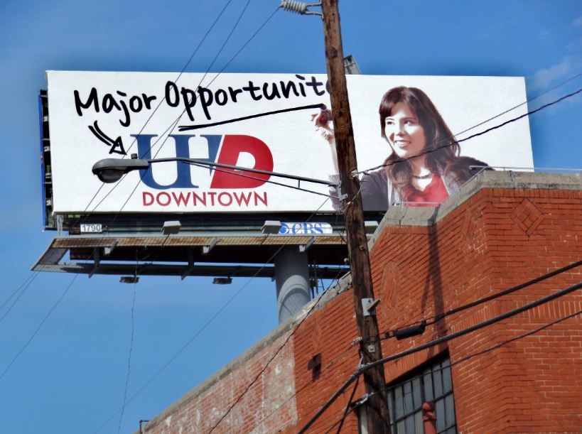 Houston in Pics: Urban University Billboard on red-brick Warehouse Buil