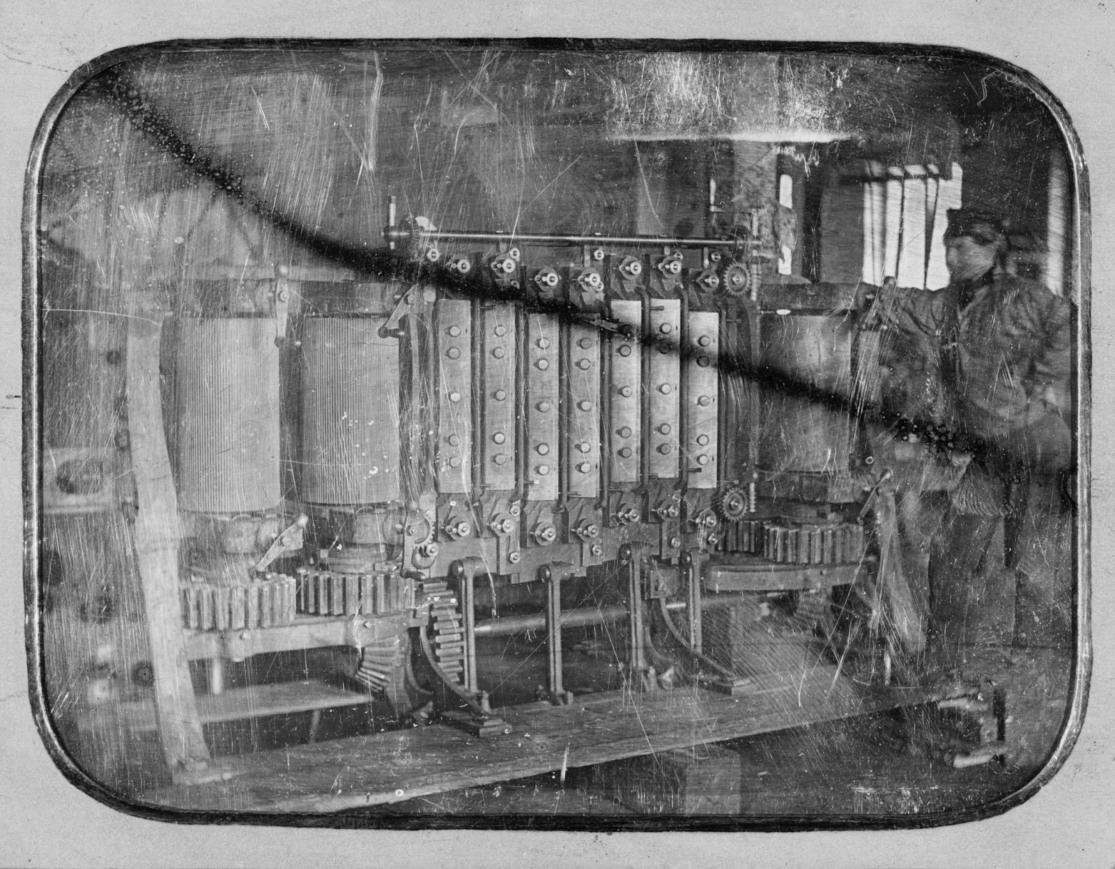 Daguerreotype of an unidentified man posing with a steam engine, c ...