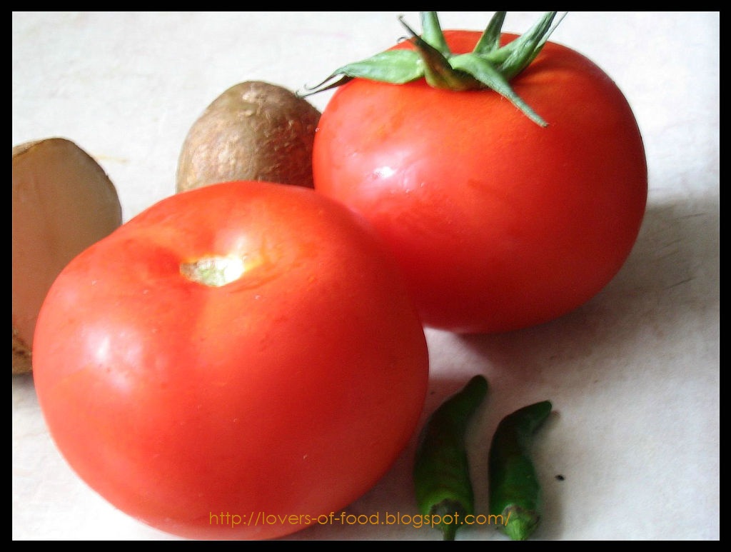 Food from all over the World: Big red fully ripe tomatoes
