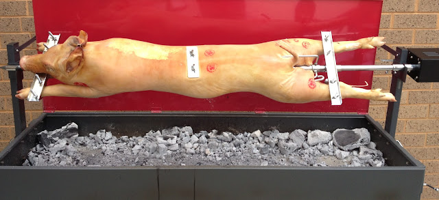 Outdoor cooking with charcoal: Spit Roasting: Bringing People Together