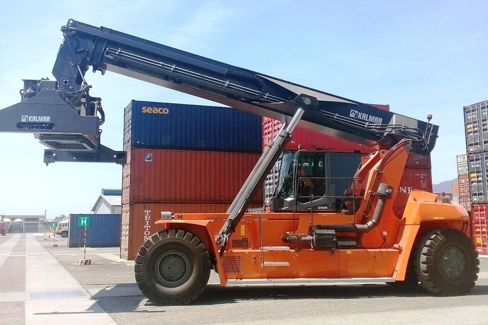 SBITC installs reach stackers to enhance Subic port operations ...