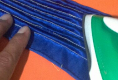 Cara membuat opnaisel sebagai variasi jahitan dalam pembuatan busana