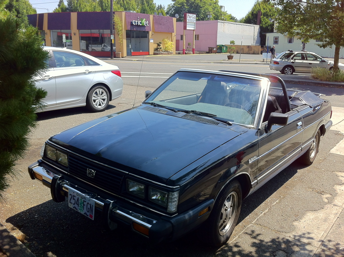 OLD PARKED CARS.: 1983 Subaru GL10 convertible by Matrix.