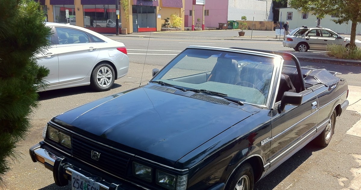 OLD PARKED CARS.: 1983 Subaru GL10 convertible by Matrix.