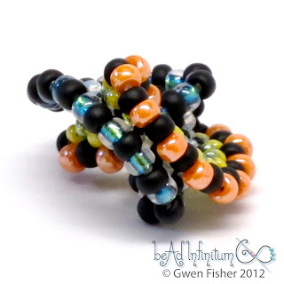 gwenbeads: Rainbow Twist Beaded Bead with 20 Repeats