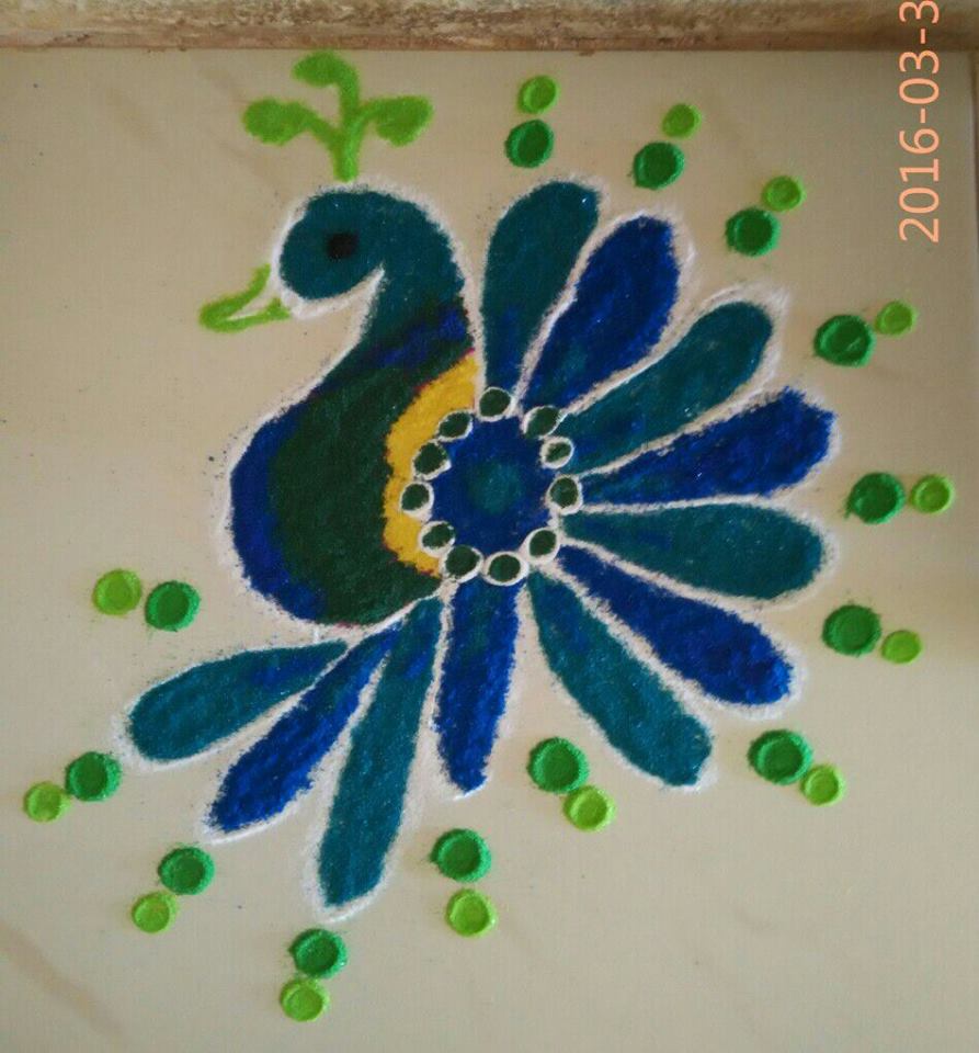 TELUGU WEB WORLD: BEAUTIFULLY COLORS DECORATED SWAN RANGOLI