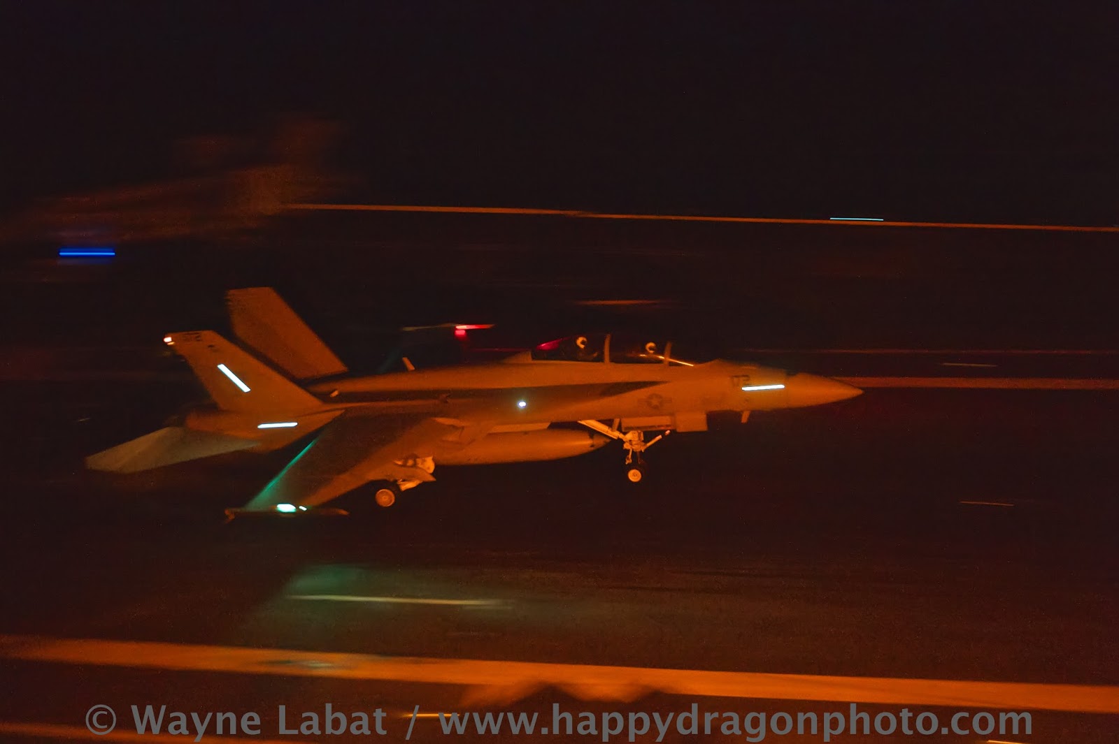 Night Flight Operations on an Aircraft Carrier