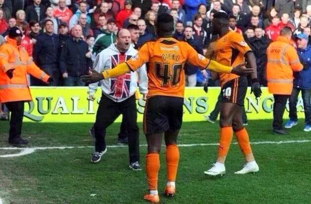 Football Hooligan Pictures: Walsall fan and Wolves players 8 March 2014
