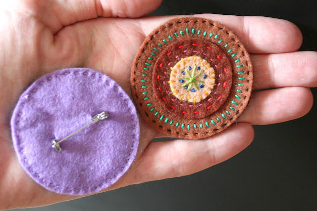 Felt circles transformed into pins.