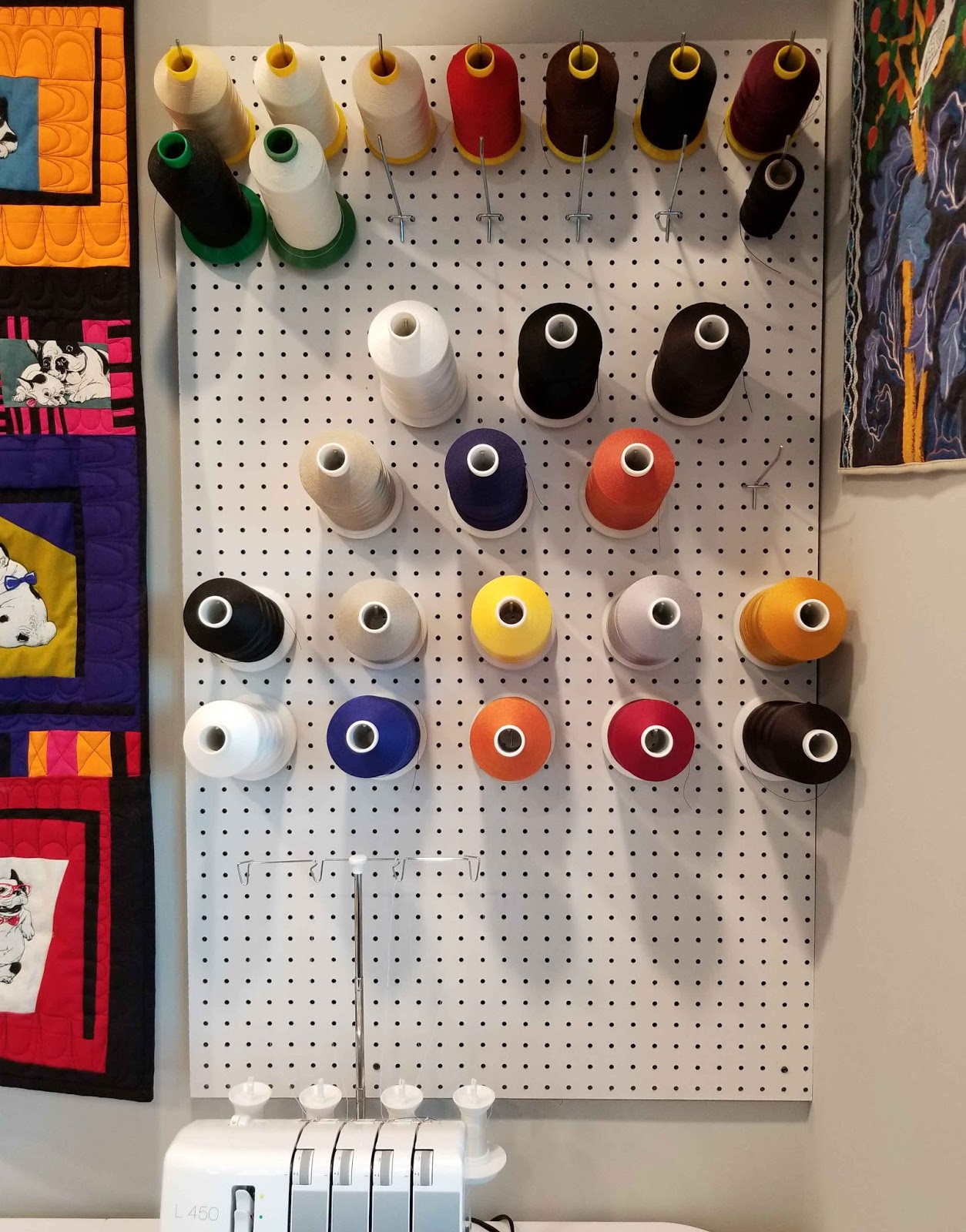 studio redo, a new Bernina serger, & new DIY large cone thread rack