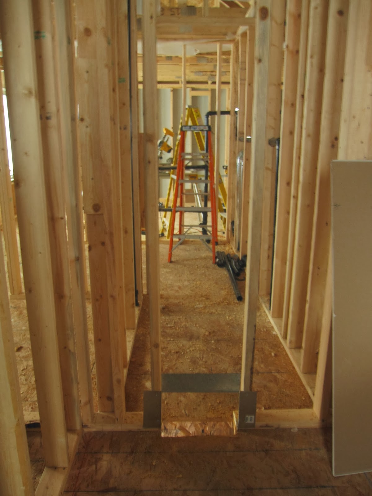 Building an infill in Westmount: roof done, garage started, plumbing ...